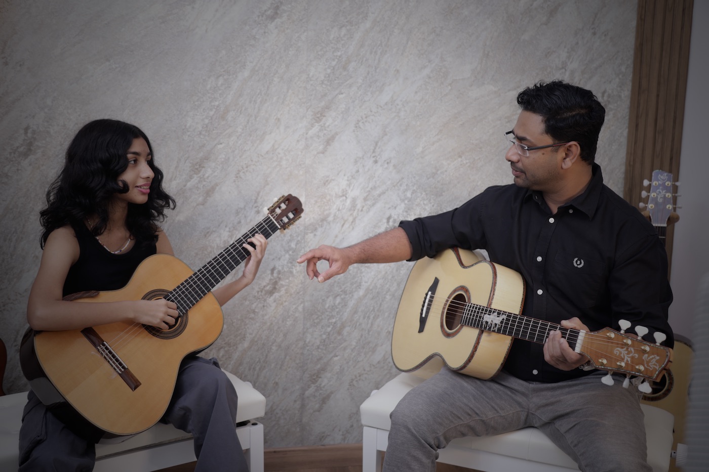 Unplugged Education: The Benefits of In-Person Guitar Lessons vs. Online Guitar Lessons - Intune ...